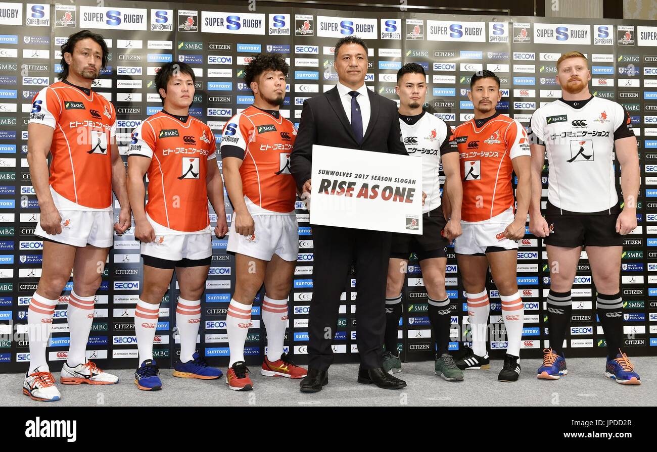 Sunwolves head coach Filo Tiatia poses for photos with his players in ...