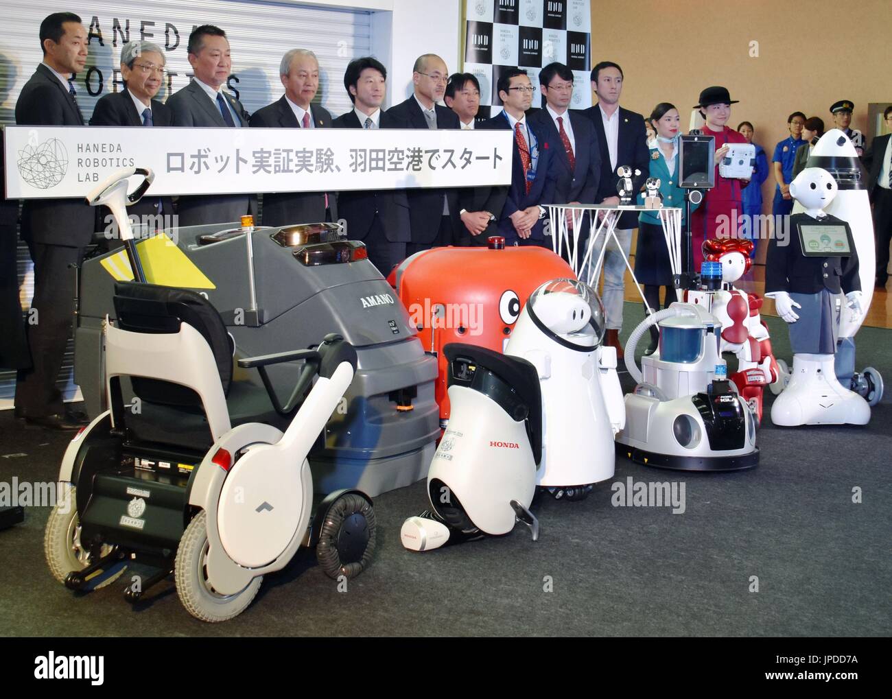 Guide and cleaning robots are introduced at Tokyo's Haneda airport on ...