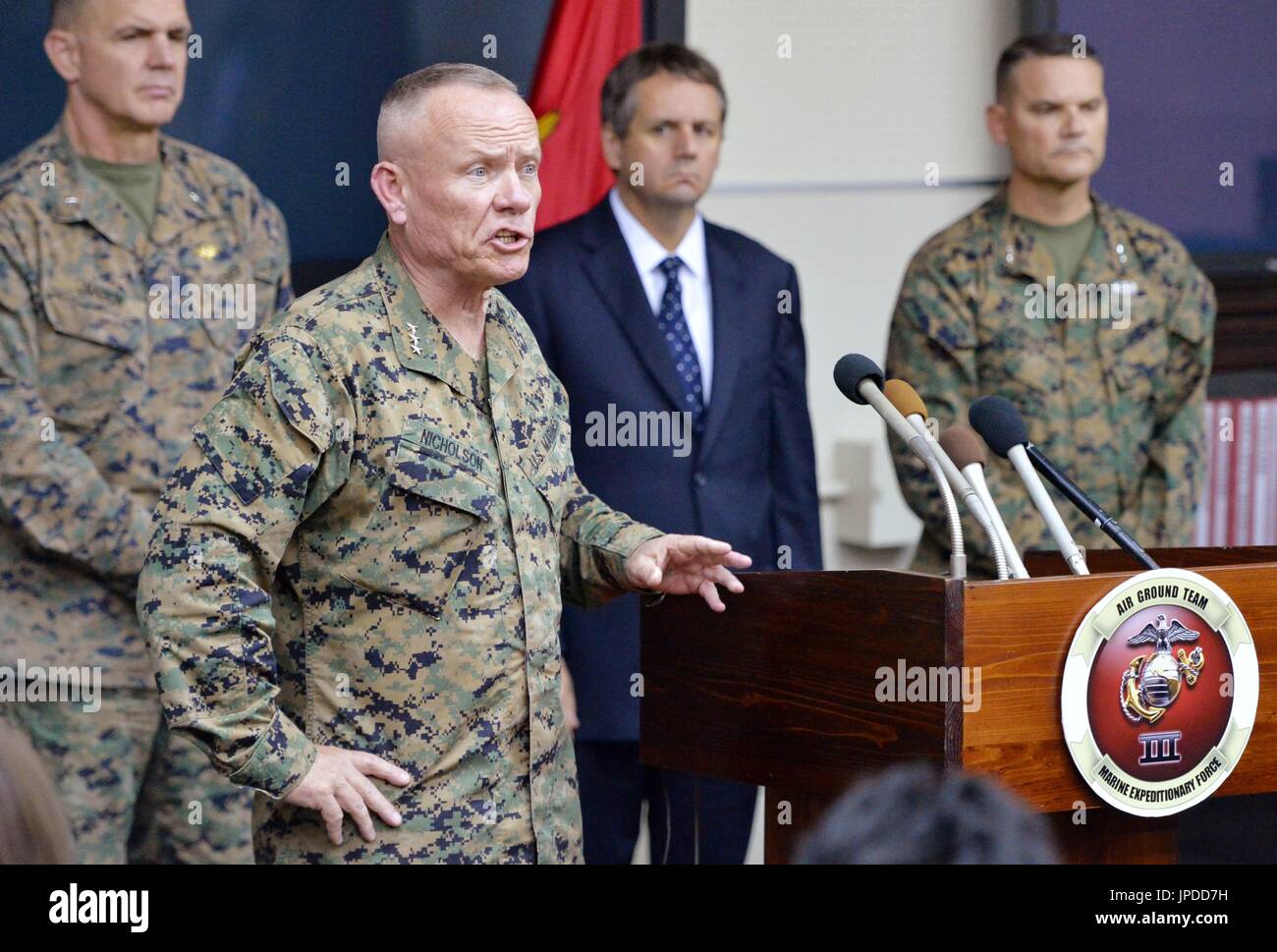 Lt. Gen. Lawrence Nicholson (2nd from L), top U.S. military commander ...