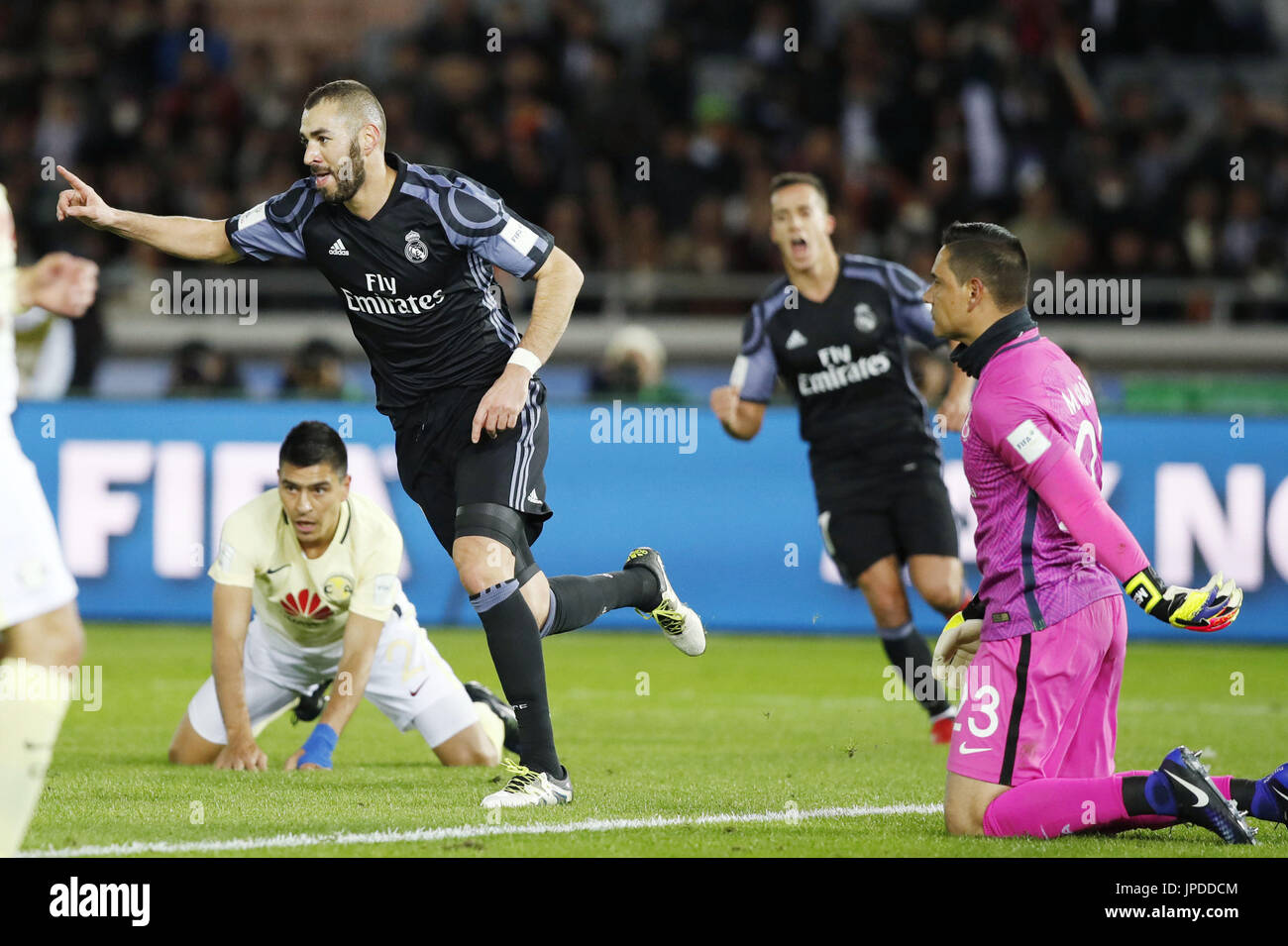 Real Madrid's Karim Benzema (2nd from L) celebrates after scoring the ...