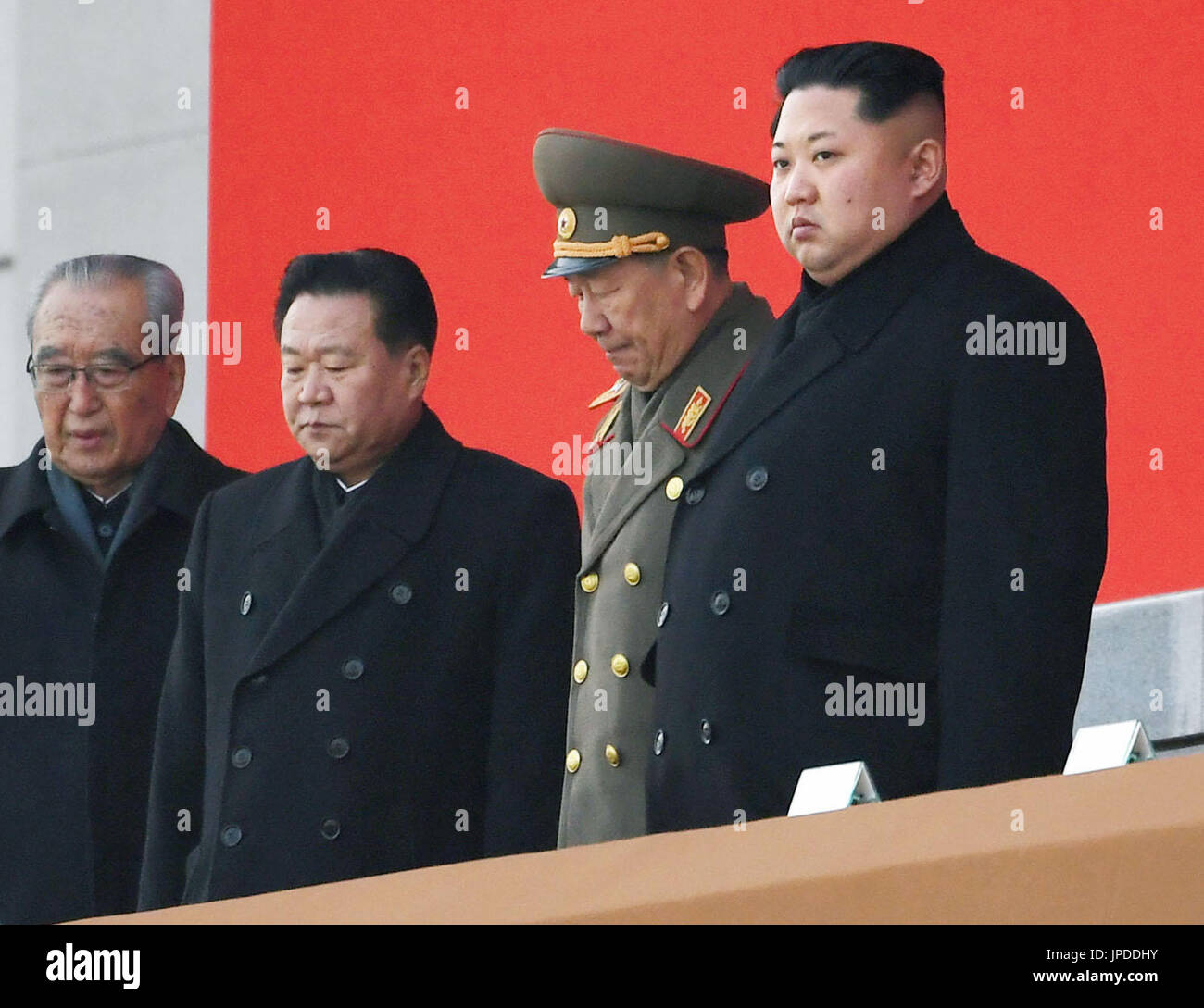 North Korean leader Kim Jong Un (far R) attends a memorial service ...