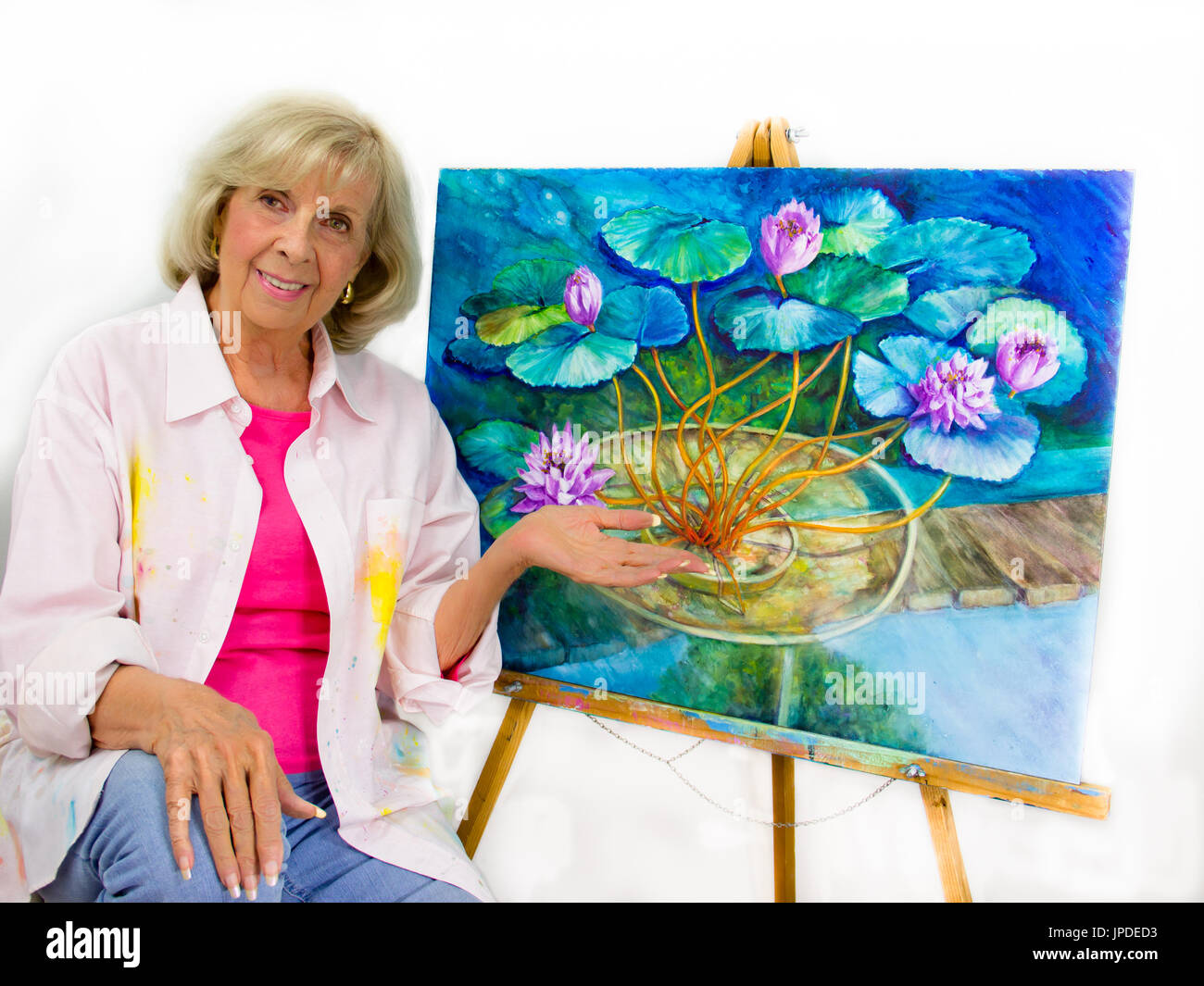 An artist is presenting her finished art Stock Photo - Alamy