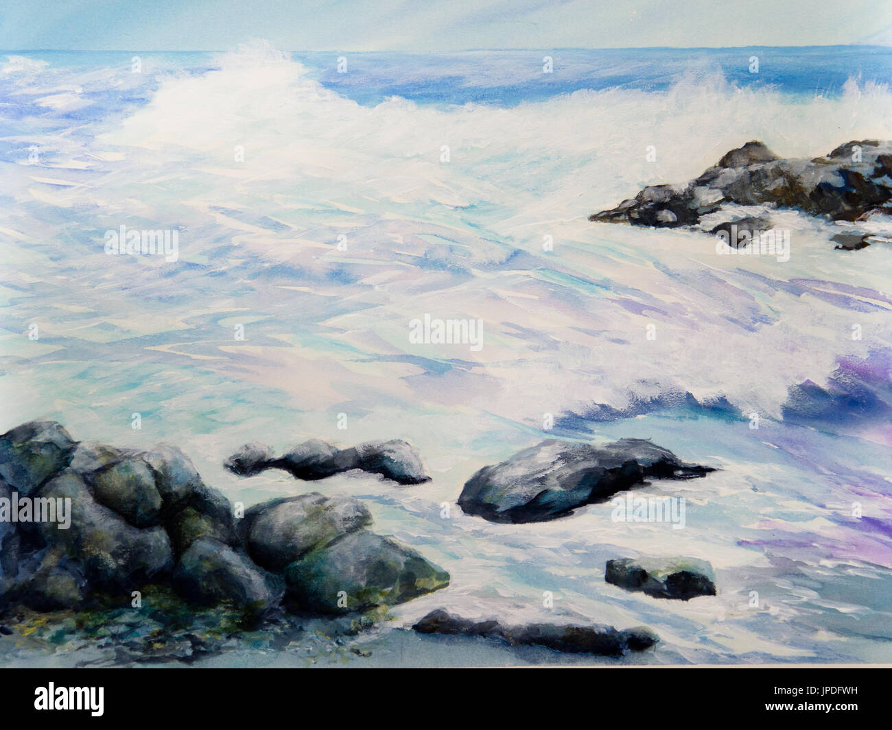 Foamy surf splashes over a rocky beach Stock Photo - Alamy