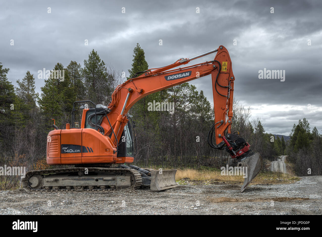 Orange digger hi-res stock photography and images - Alamy
