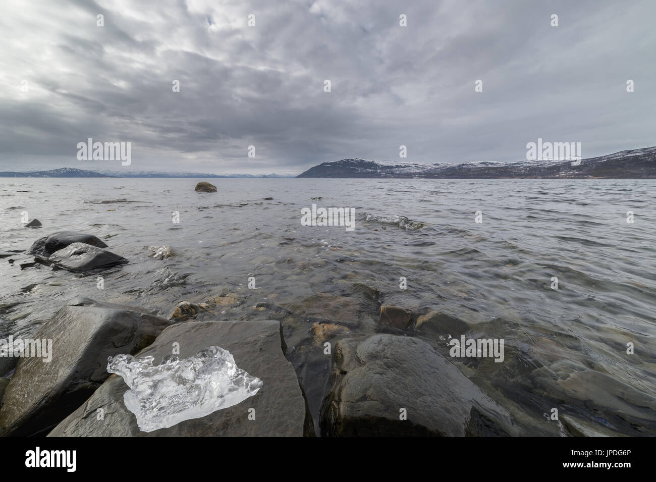 ice brick rock rocks water ocean cold cloudy Stock Photo - Alamy
