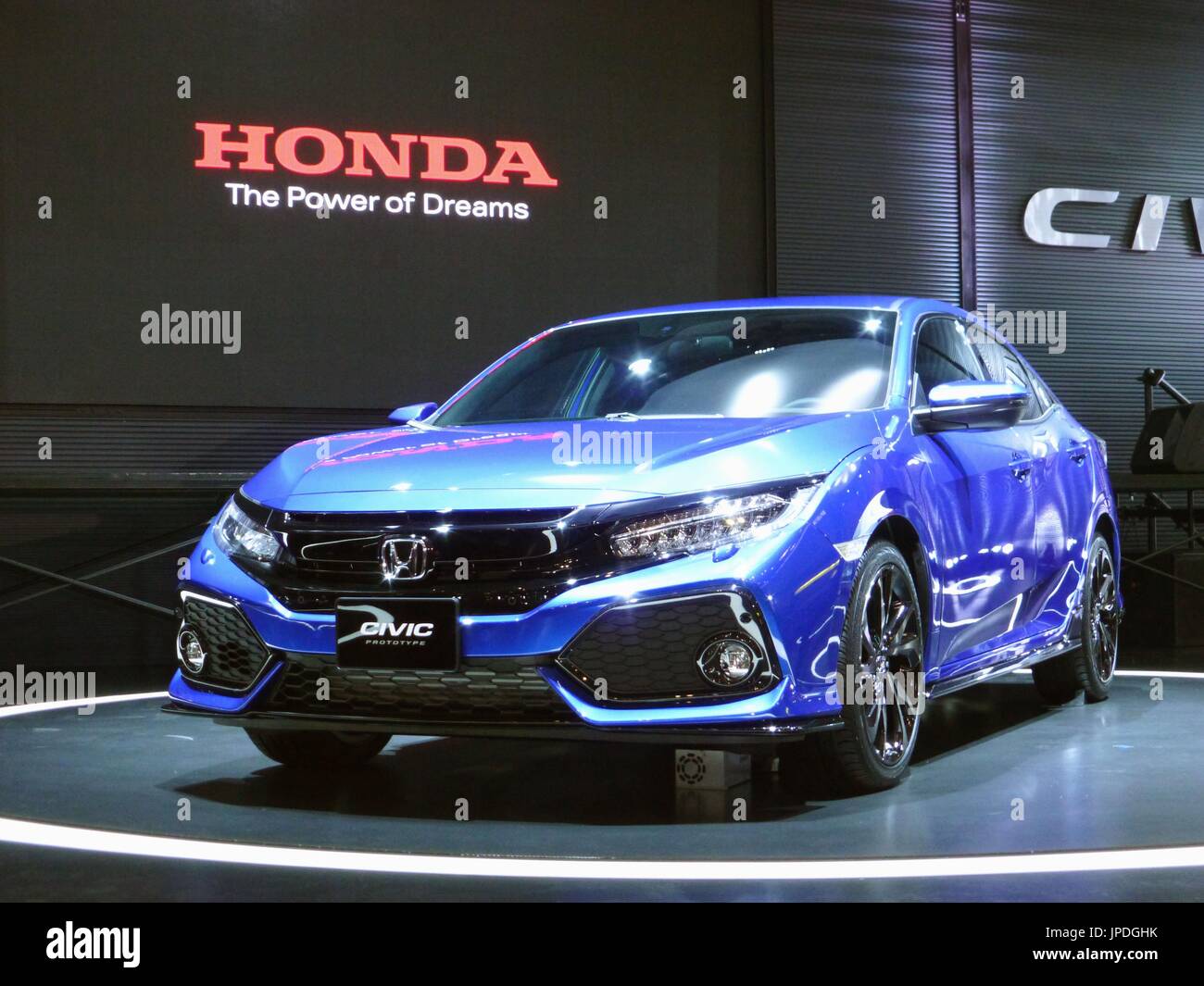 Honda Motor Co. unveils its Civic hatchback at the Tokyo Auto Salon at ...