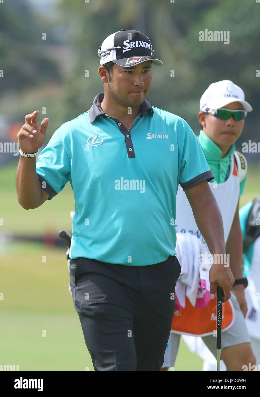 Japan's Hideki Matsuyama acknowledges the gallery after setting up a birdie chance on the second ...