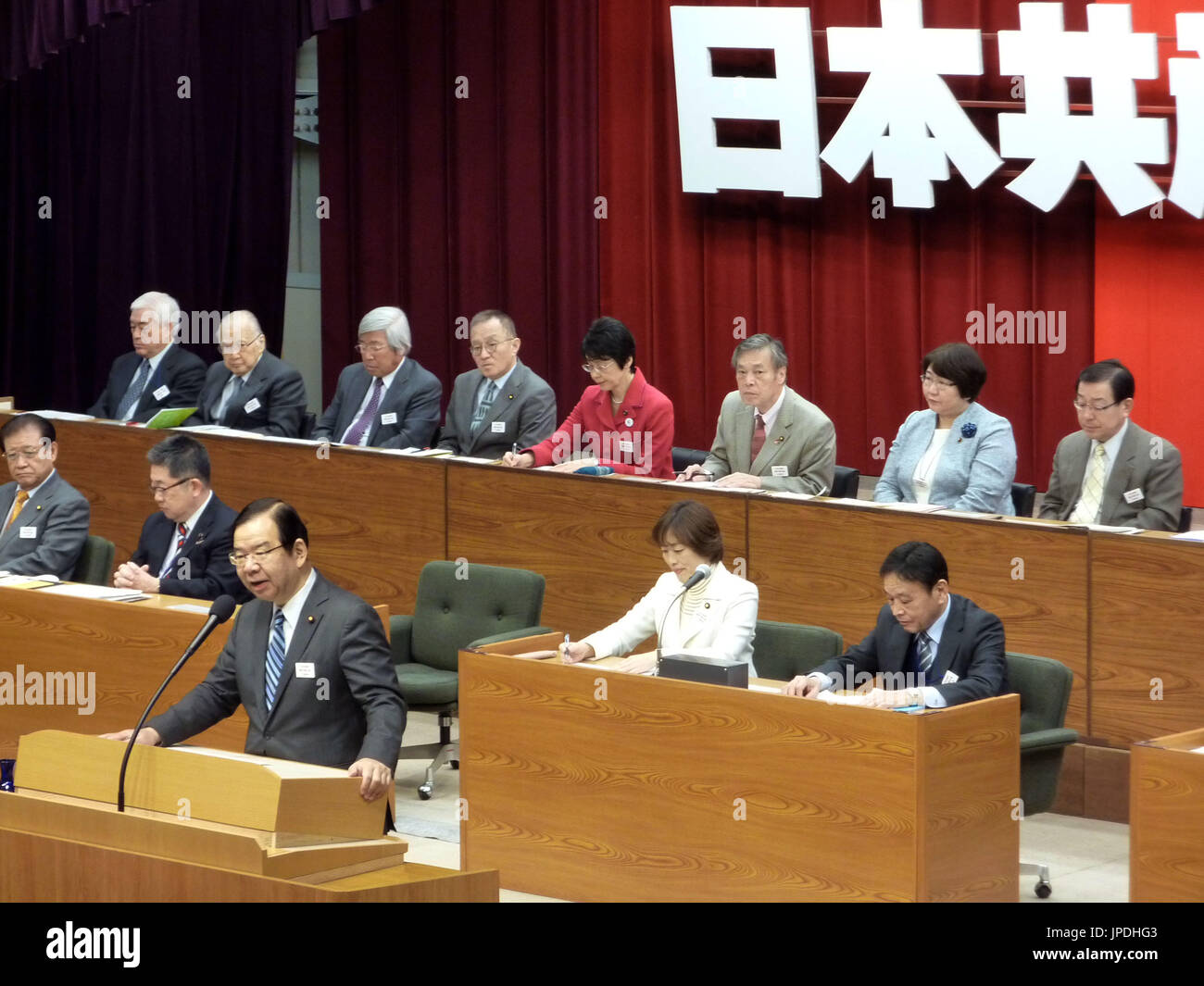 Japanese Communist Party leader Kazuo Shii (front) addresses a party ...