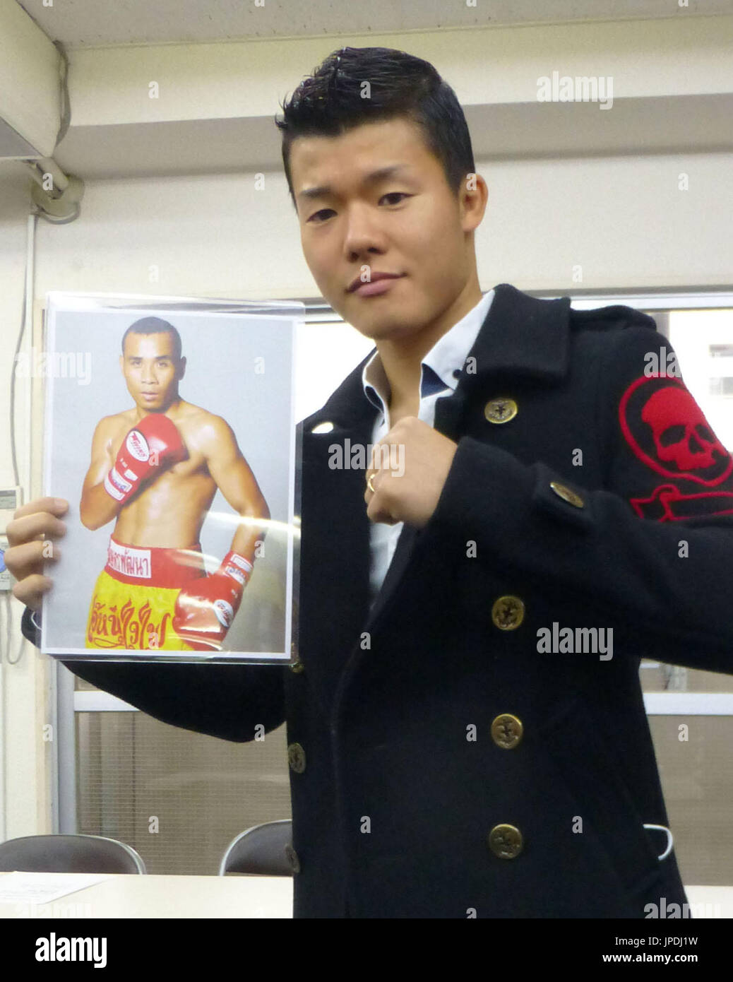 Former WBO bantamweight champion Tomoki Kameda of Japan poses with a ...