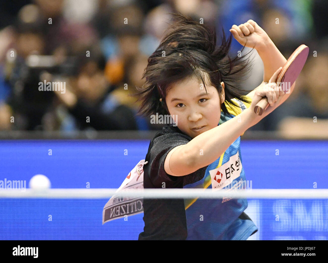 Miu Hirano plays against Kasumi Ishikawa in the women's singles final ...