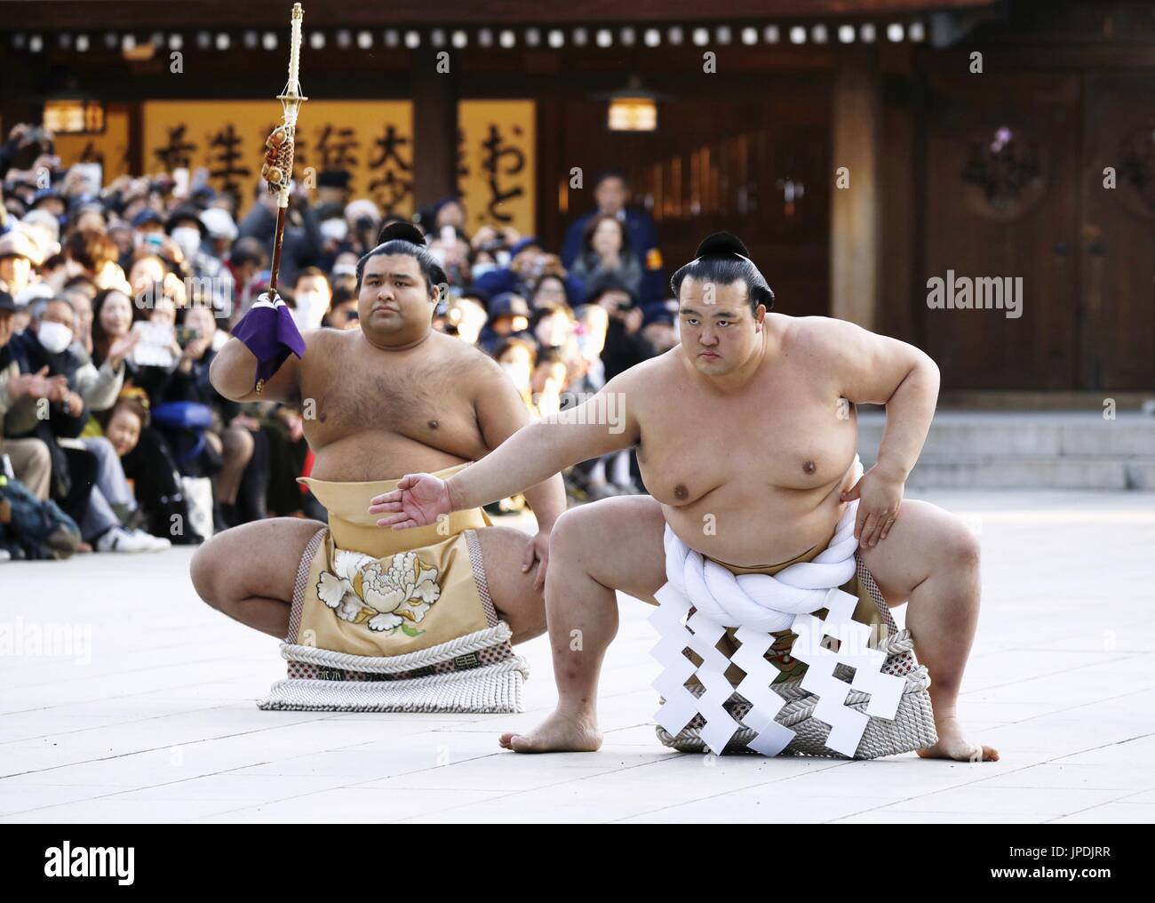 New yokozuna Kisenosato (R) performs his first ring-entry ceremony on ...