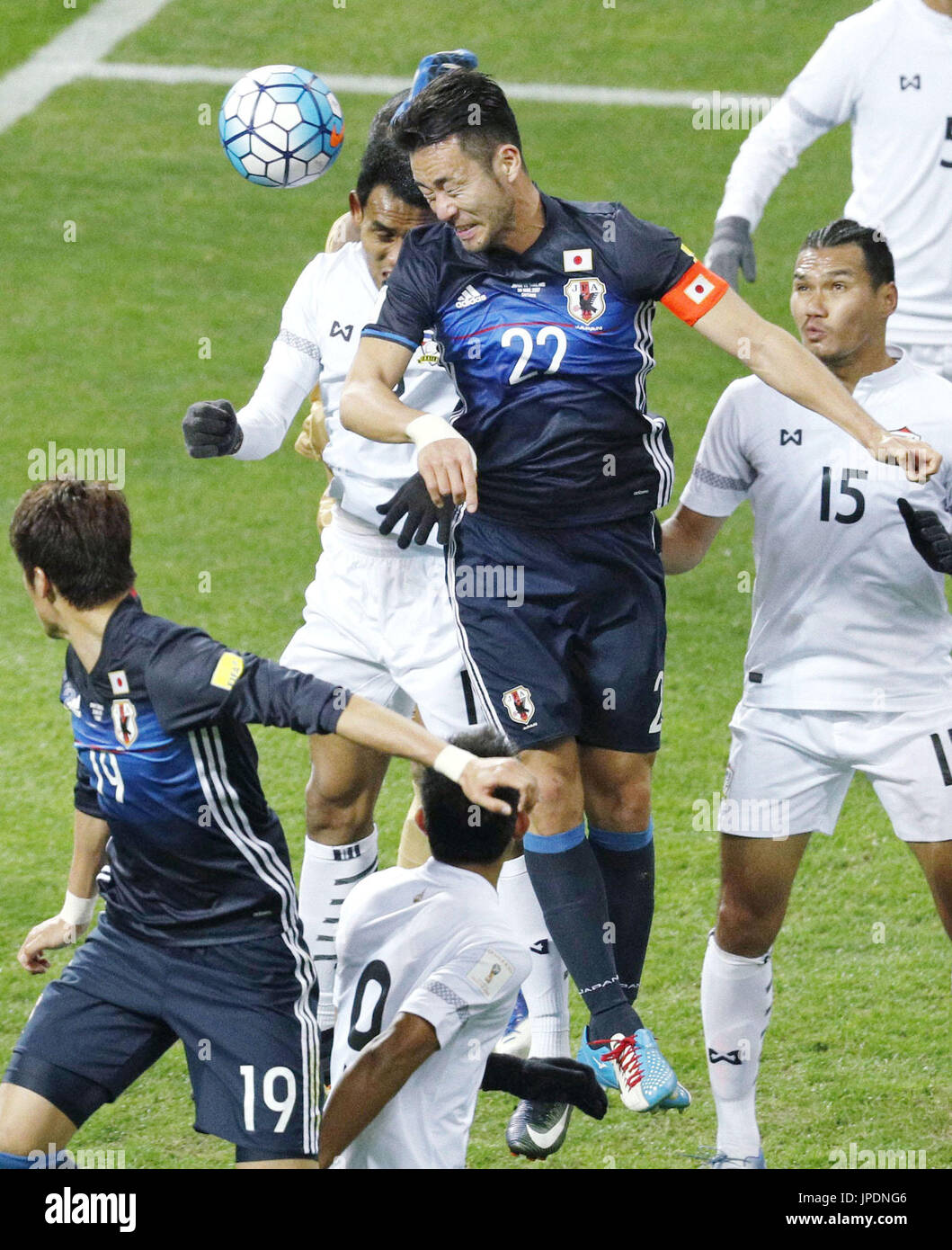 Japan's Maya Yoshida (22) heads his side's fourth goal during the ...