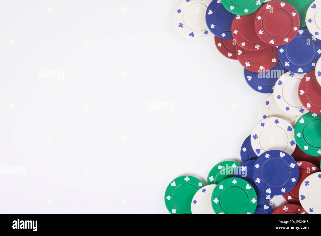 Colorful border of assorted casino chips isolated on white with copy ...