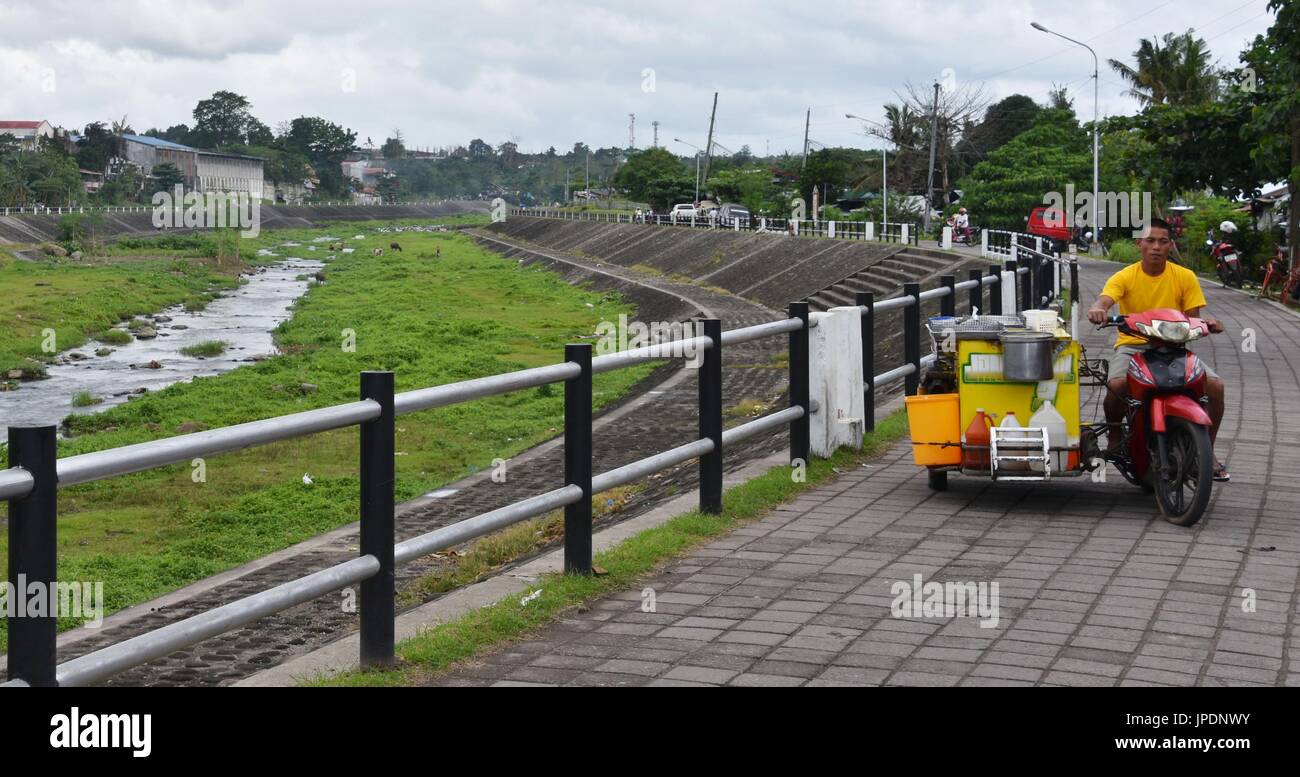 Photo taken in February shows a river bank in the central Philippine ...
