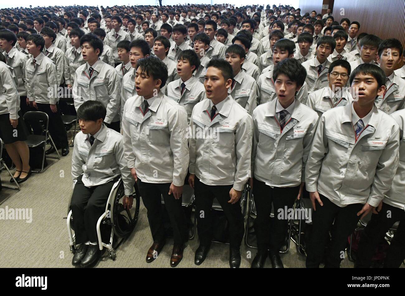 More than 2,100 new employees of Toyota Motor Corp. attend a welcome ...