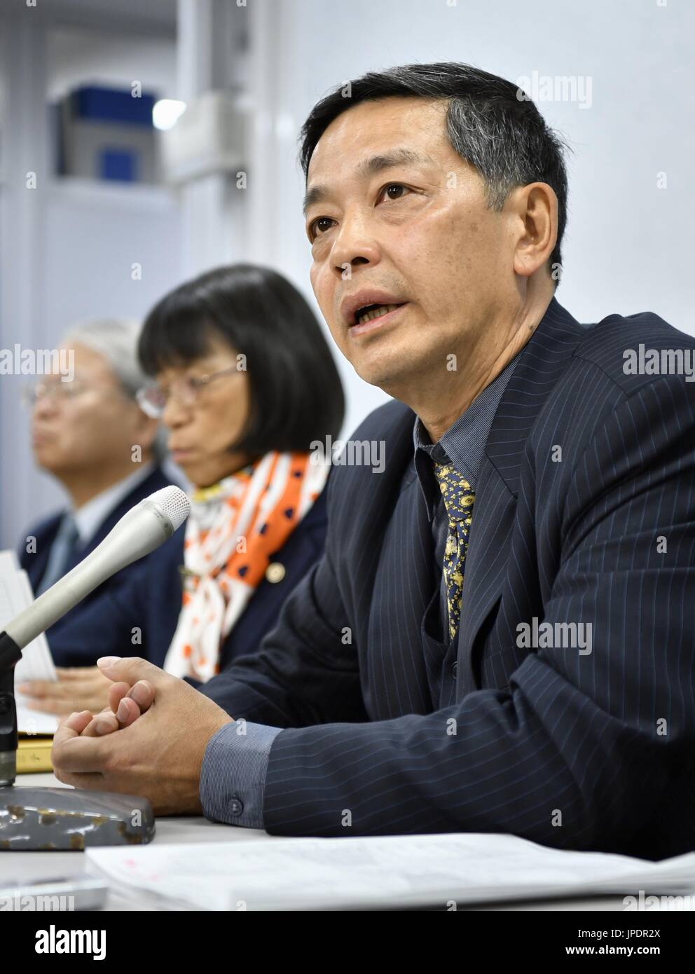 Koichi Fujiwara, chief of Osaka-based construction firm Fujiwara Kogyo, attends a press ...