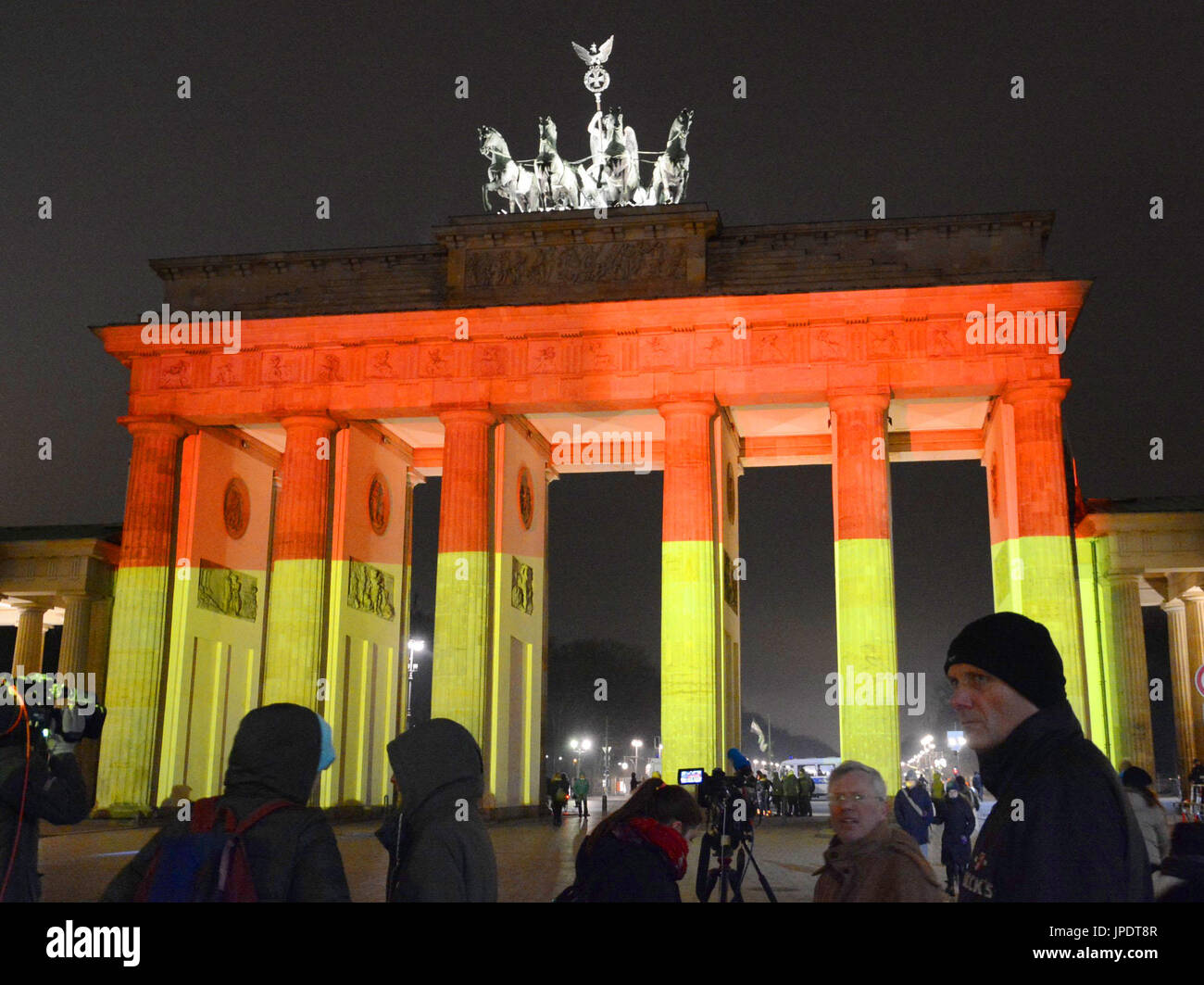 Brandenburg Gate in Berlin is lit up in black, red and gold, the colors ...