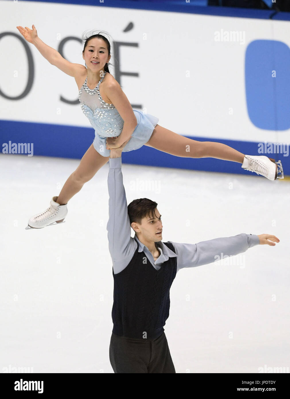 Canada's Francis Boudreau-Audet (bottom) lifts his partner Sumire Suto ...