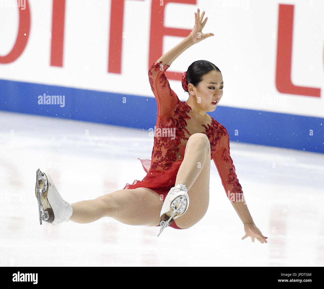 Mao Asada falls during her performance in the women's free program at ...
