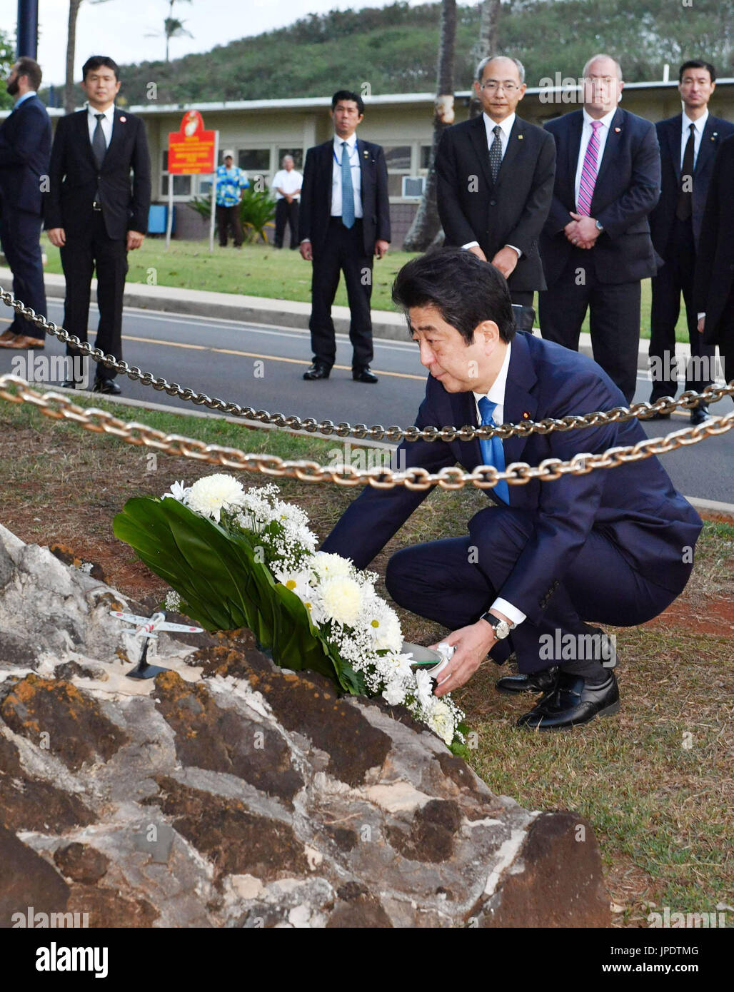 Japanese Prime Minister Shinzo Abe offers a wreath at a memorial to Lt ...
