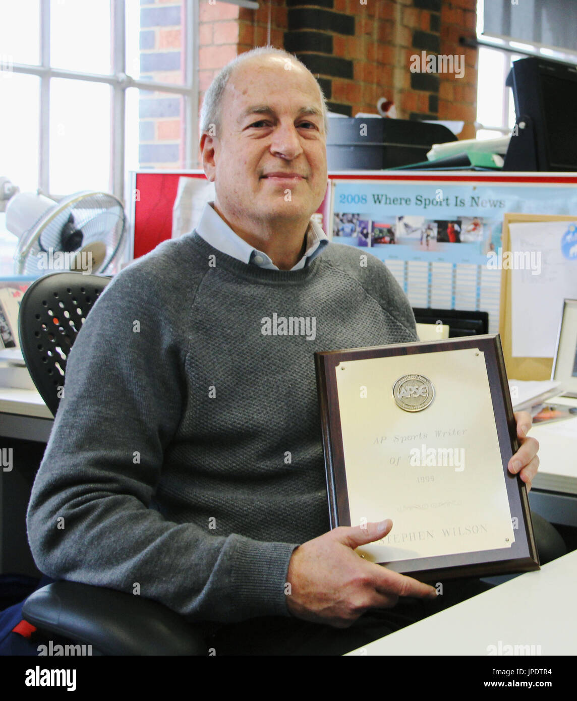 Steve Wilson, known in journalism circles as "Mr. Olympics," poses for ...