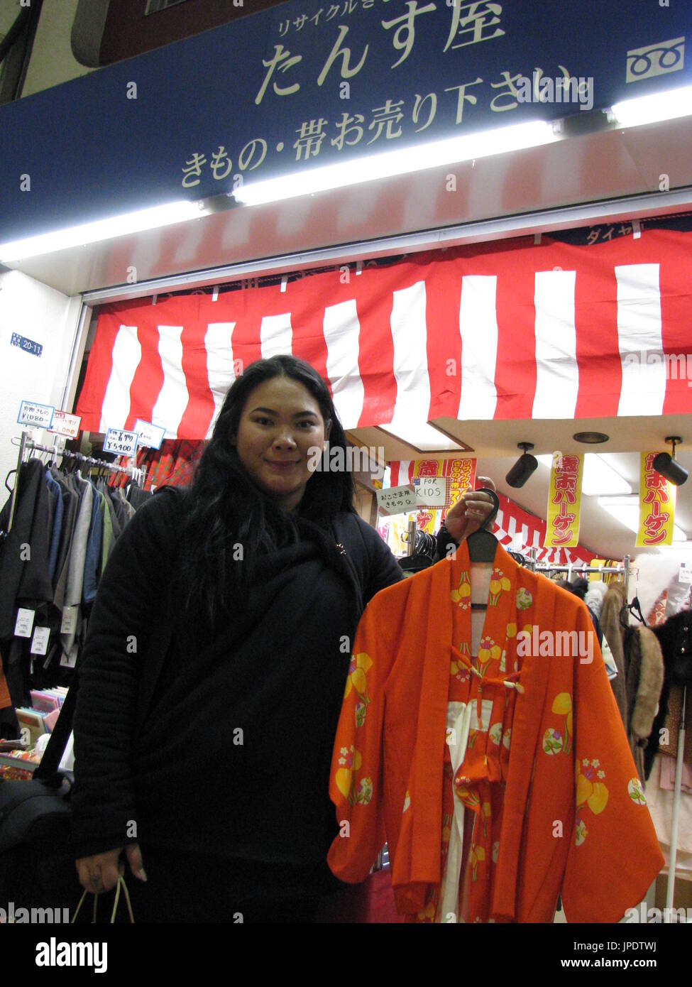 Katherine Castaneda, 20, from the Philippines, poses with a secondhand kimono at a Tansuya shop ...