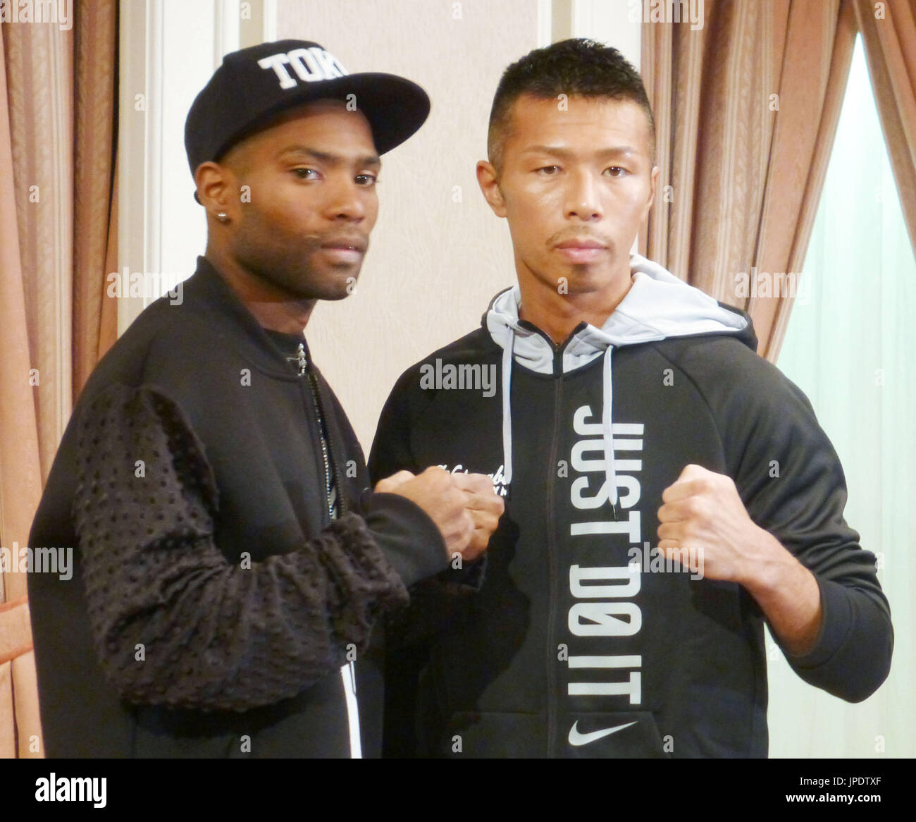 Jezreel Corrales (L) of Panama, super champion of the WBA super ...