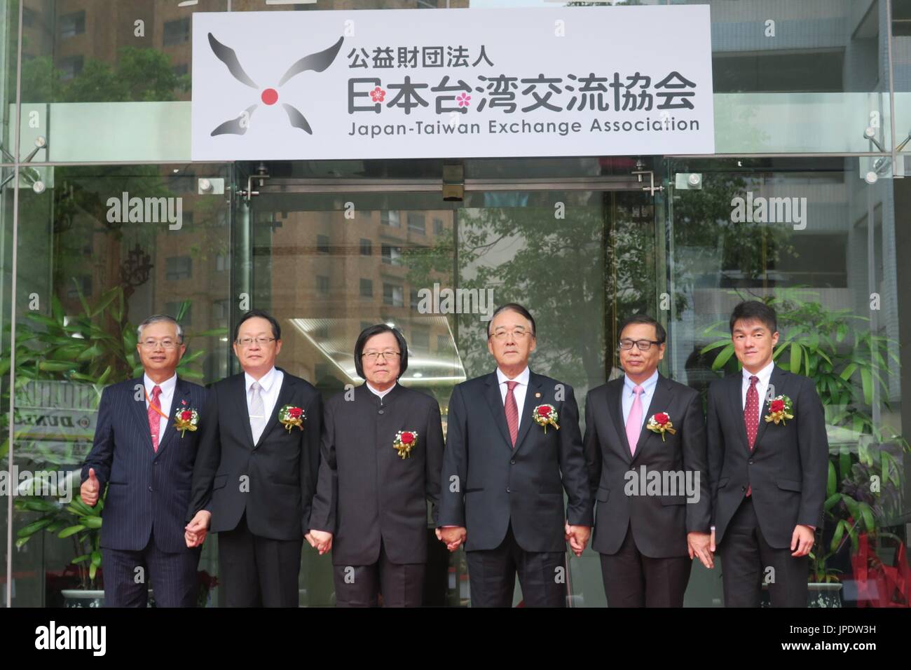 Japan's de facto ambassador to Taiwan Mikio Numata (3rd from R) and his Taiwanese counterpart ...
