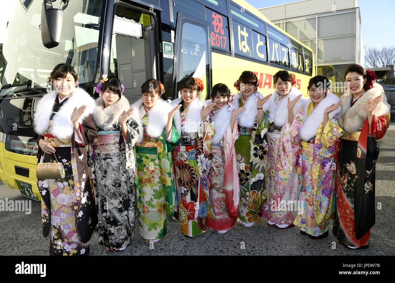 Tour guides of Hato Bus Co. pose in kimono during a ceremony marking ...