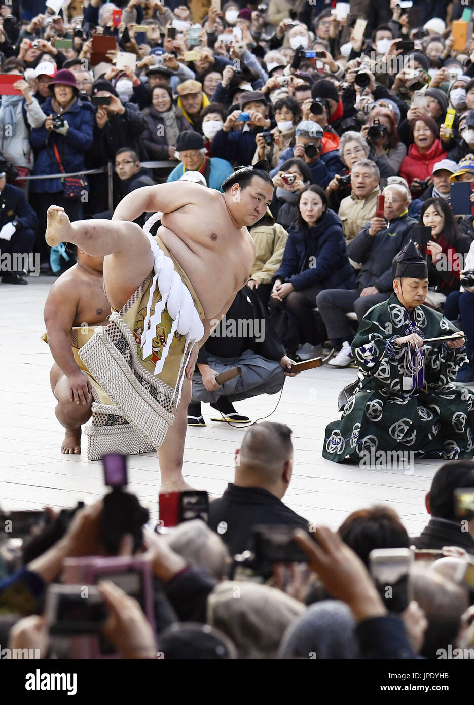 New yokozuna Kisenosato performs his first ring-entry ceremony on Jan ...
