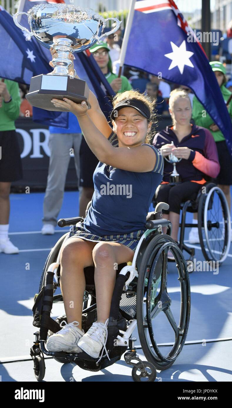 Japan's Yui Kamiji holds the trophy after defeating Rio Paralympics ...