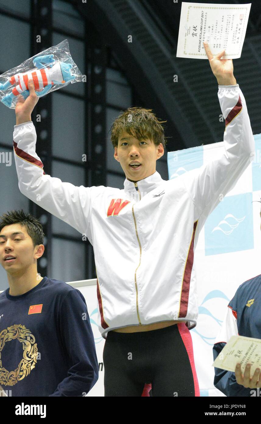 Ippei Watanabe acknowledges the crowd after breaking the world record ...