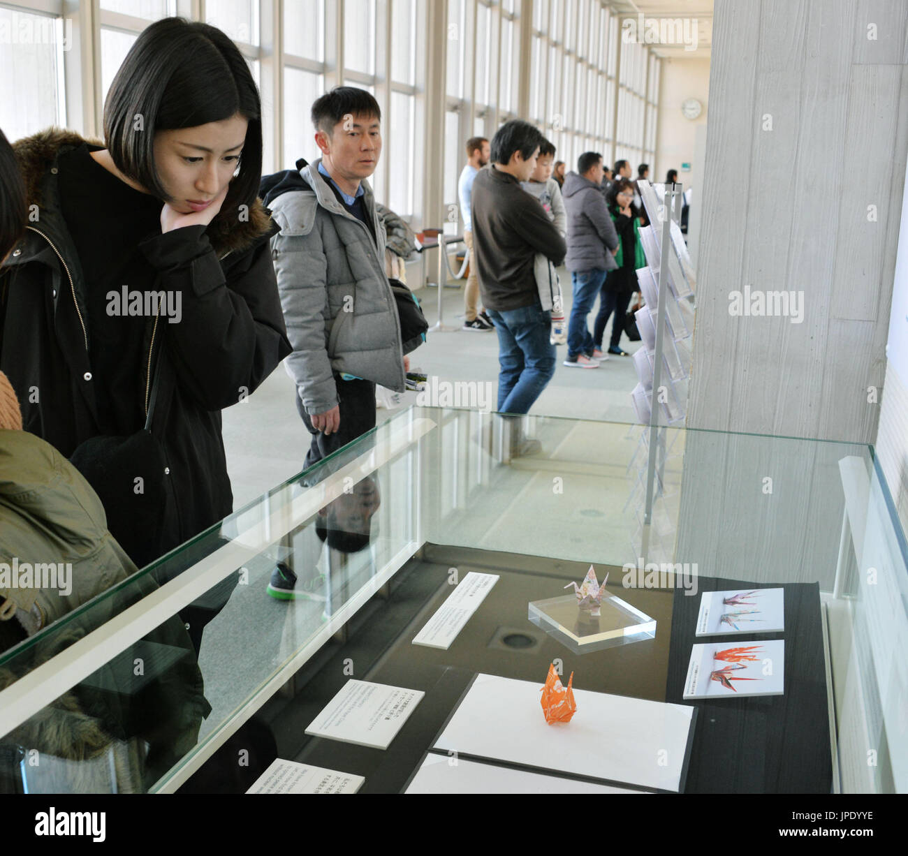 Visitors look at paper cranes presented by former U.S. President Barack ...