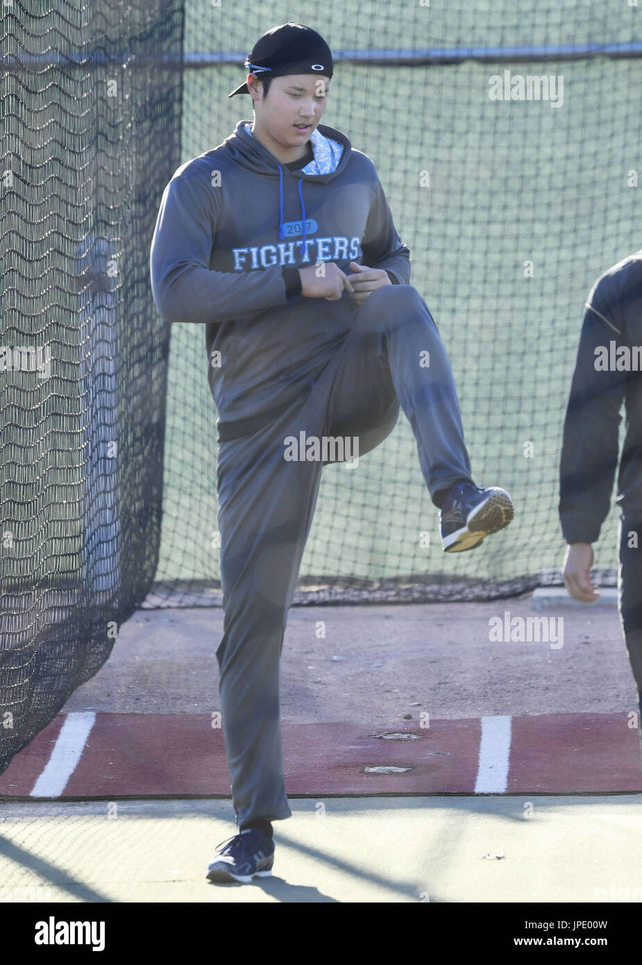 Nippon Ham Fighters pitcher-designated hitter Shohei Otani warms up in ...