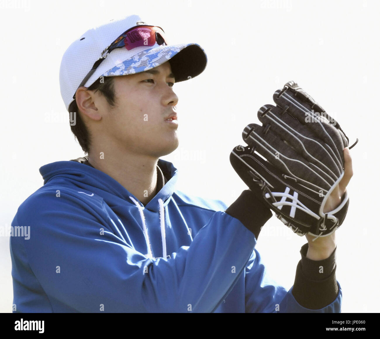 Nippon Ham Fighters pitcher-designated hitter Shohei Otani plays catch ...