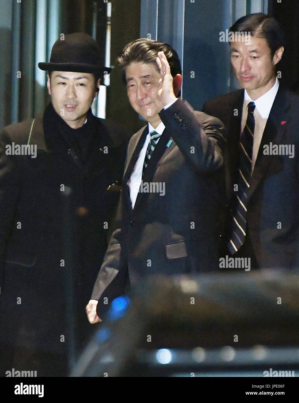 Prime Minister Shinzo Abe (C) is pictured following his talks with Toyota Motor Corp. President ...