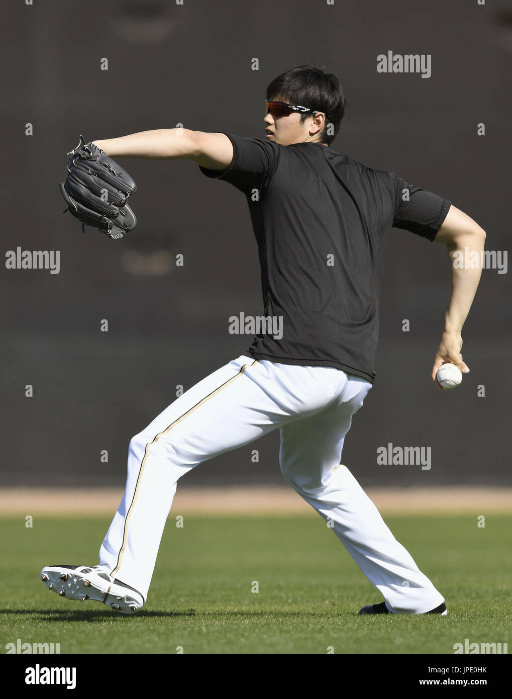 Nippon Ham Fighters slugging ace pitcher Shohei Otani trains wearing ...