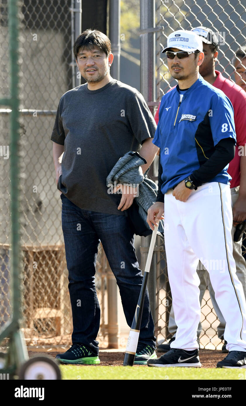 Former major league pitcher Hideo Nomo (L) visits the training camp of the Nippon Ham Fighters ...