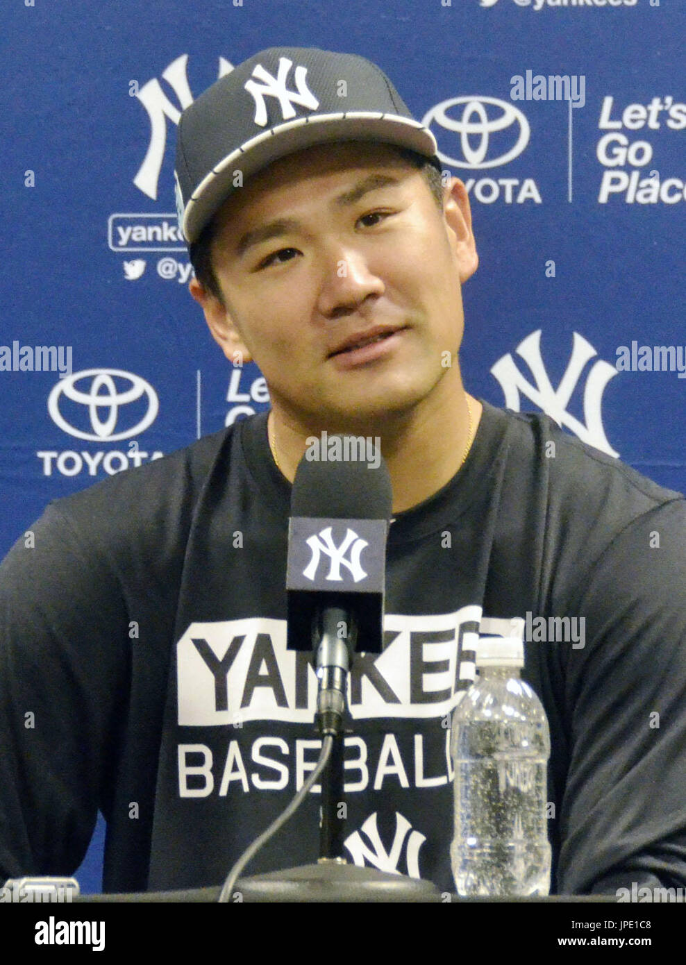 New York Yankees right-hander Masahiro Tanaka meets with reporters following the first day of ...
