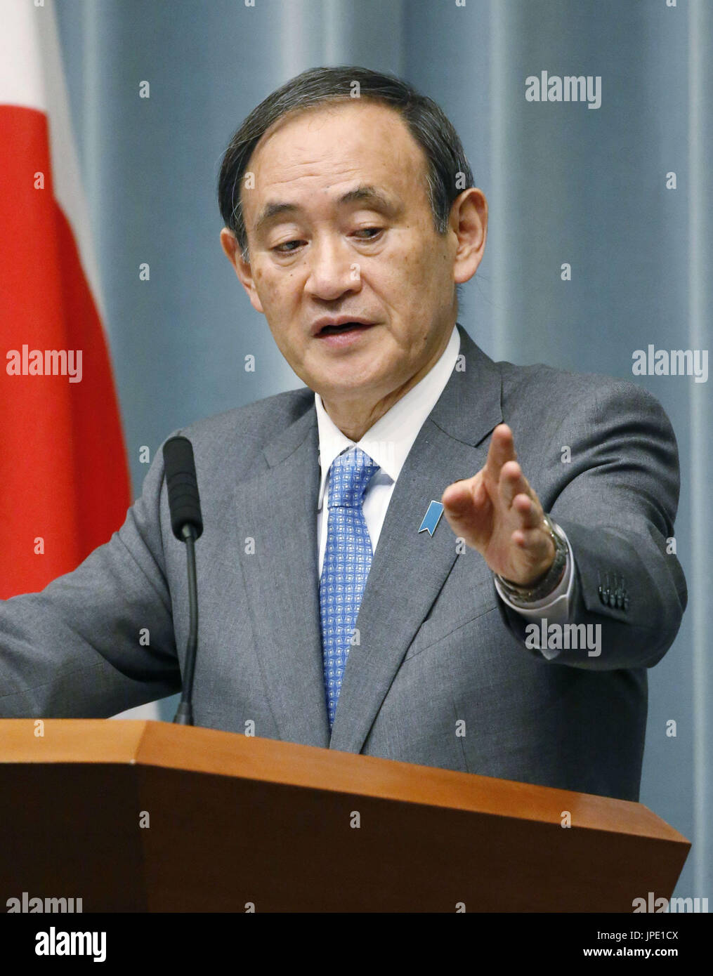 Chief Cabinet Secretary Yoshihide Suga, at a press conference in Tokyo ...