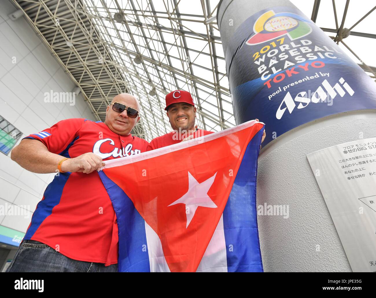 Cuban fans pose for a photo ahead of the World Baseball Classic Pool B ...