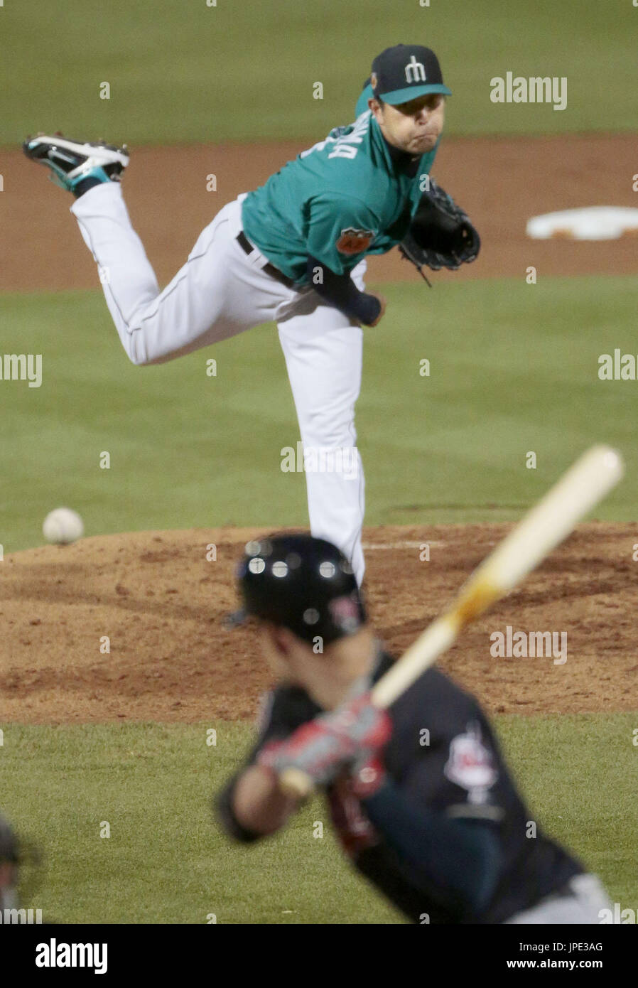 Hisashi Iwakuma of the Seattle Mariners pitches in a spring training ...