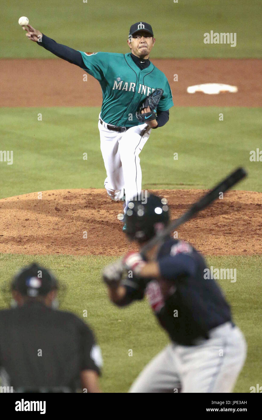 Hisashi Iwakuma of the Seattle Mariners pitches in a spring training ...