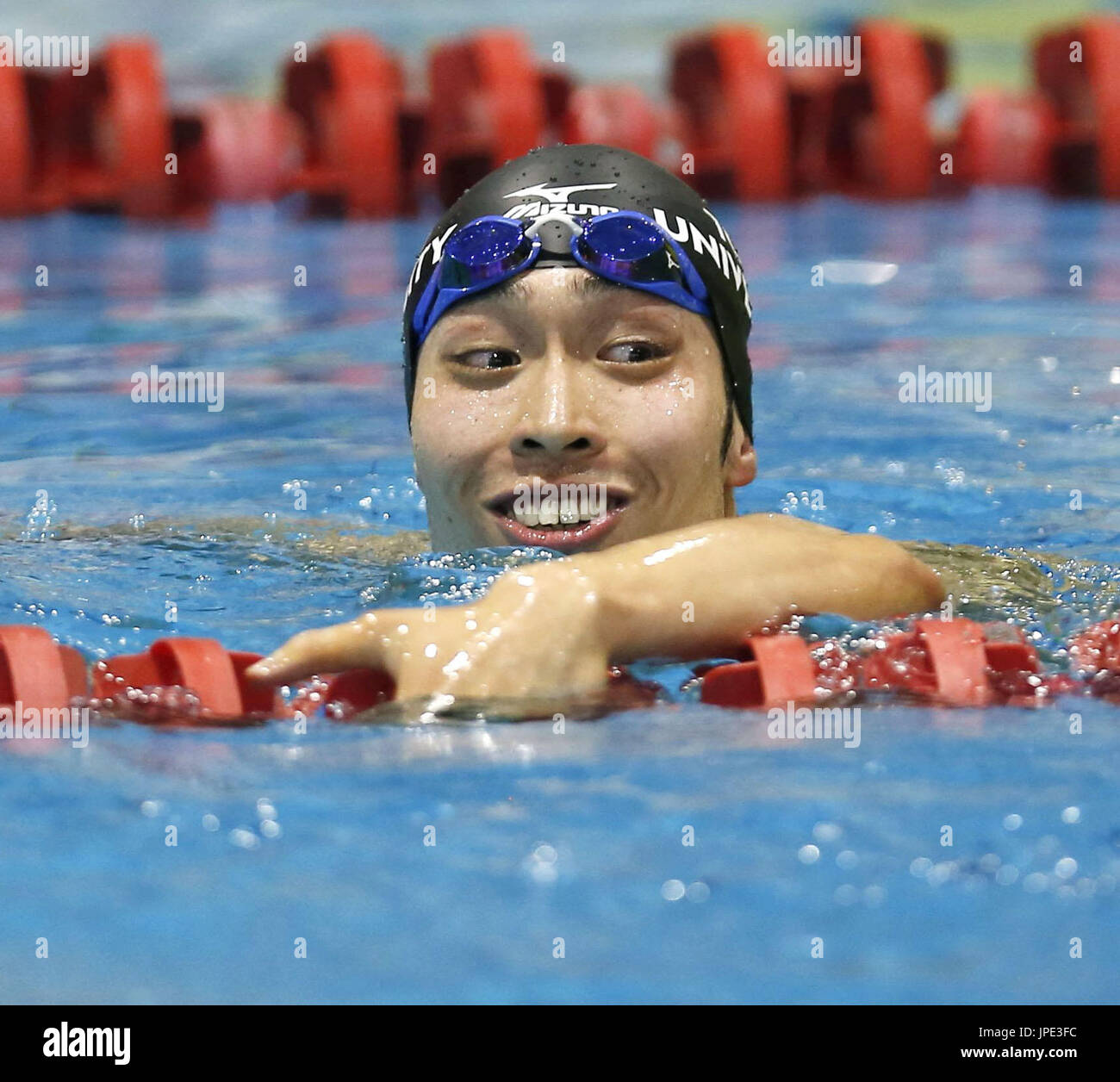 Kosuke Hagino of Japan smiles after winning the 400-meter individual ...