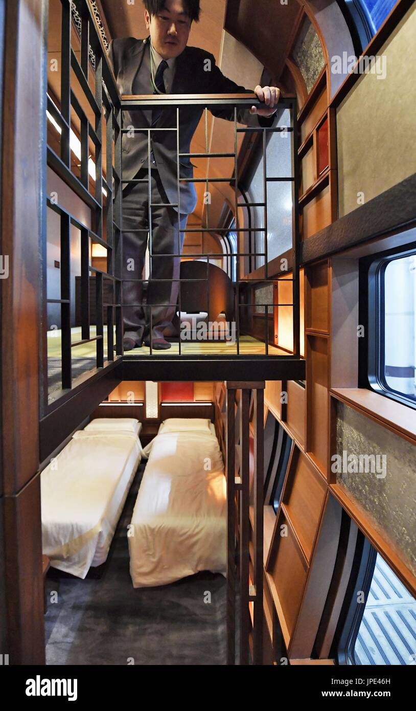 Photo taken March 16, 2017, at JR Ueno Station in Tokyo shows a two ...