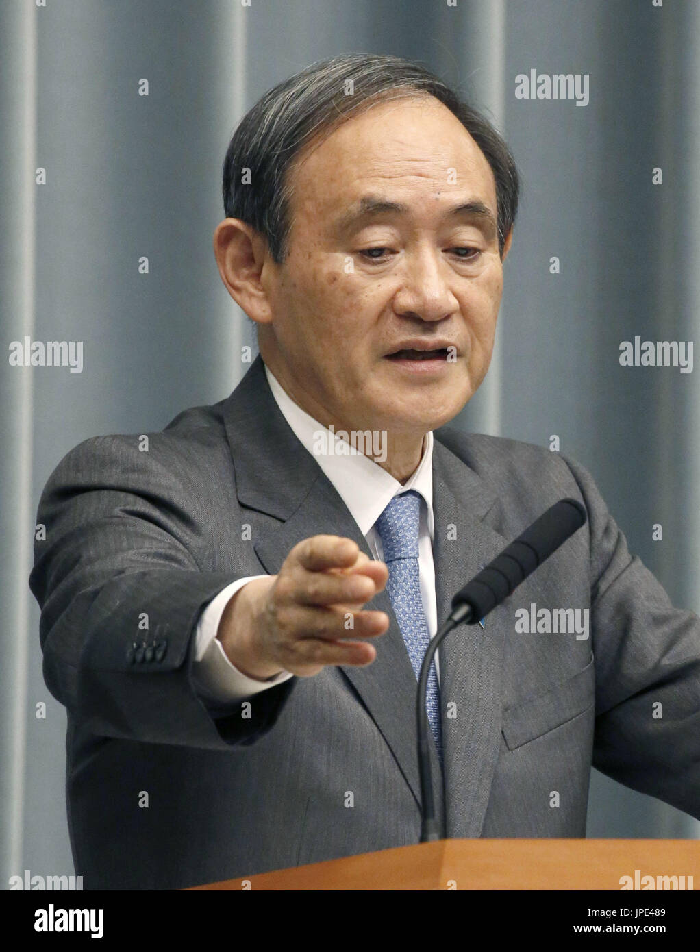 Japanese Chief Cabinet Secretary Yoshihide Suga speaks at a regular ...