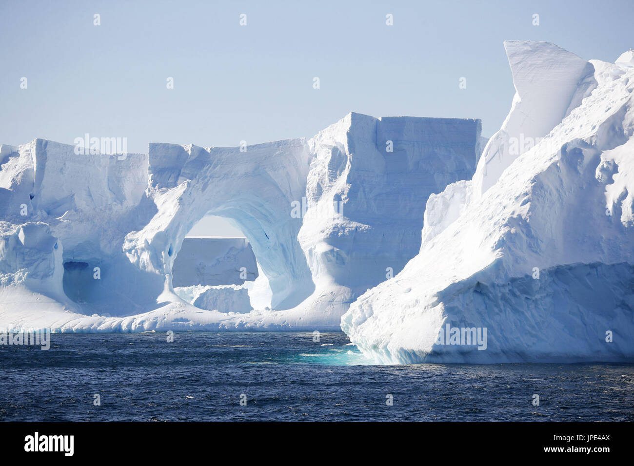 A group of icebergs more than 50 meters high are seen from aboard the ...