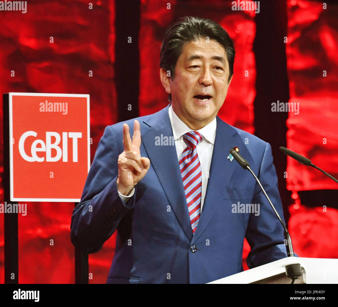 Japanese Prime Minister Shinzo Abe makes a speech in front of German ...