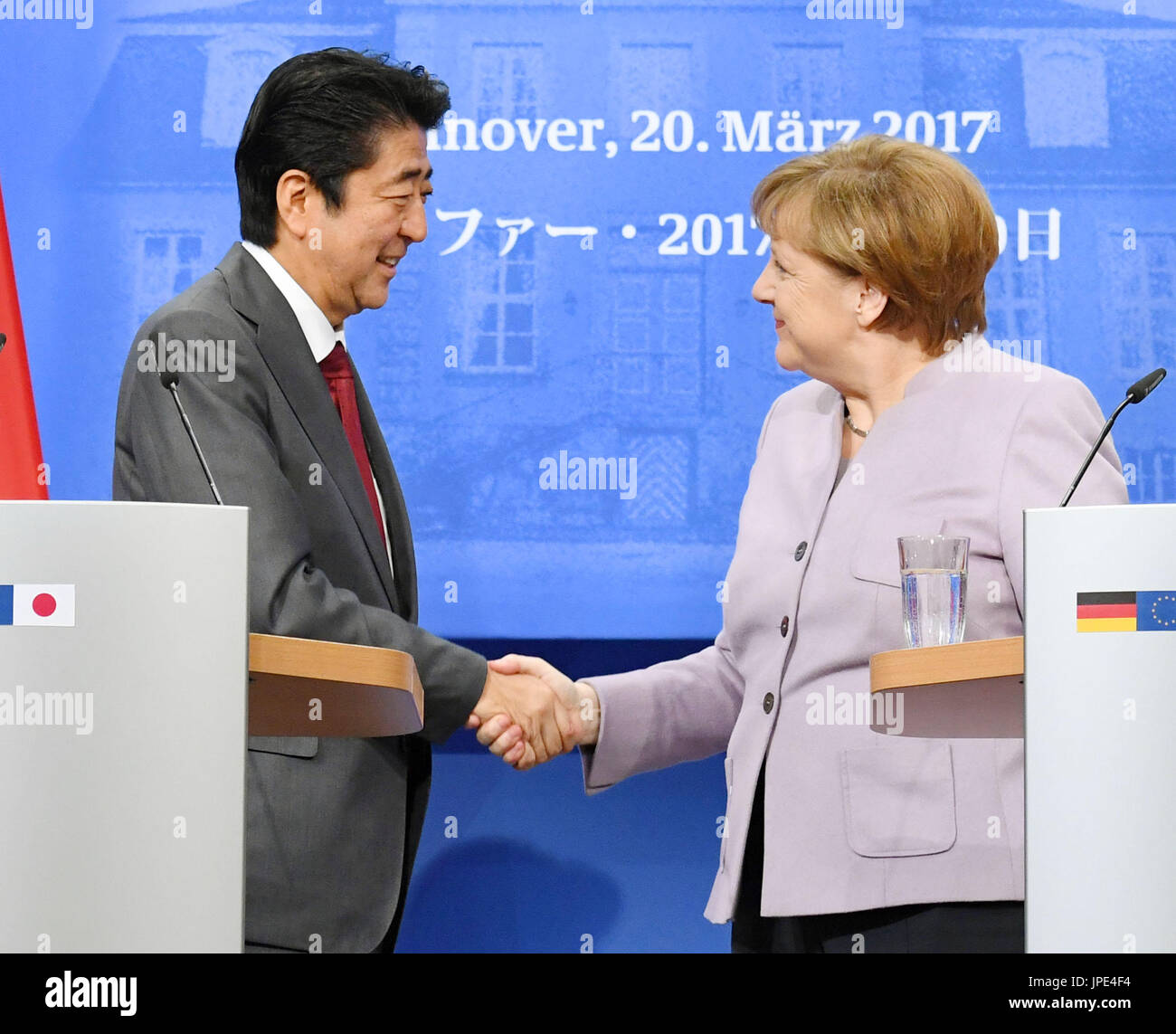 Japanese Prime Minister Shinzo Abe (L) and German Chancellor Angela ...