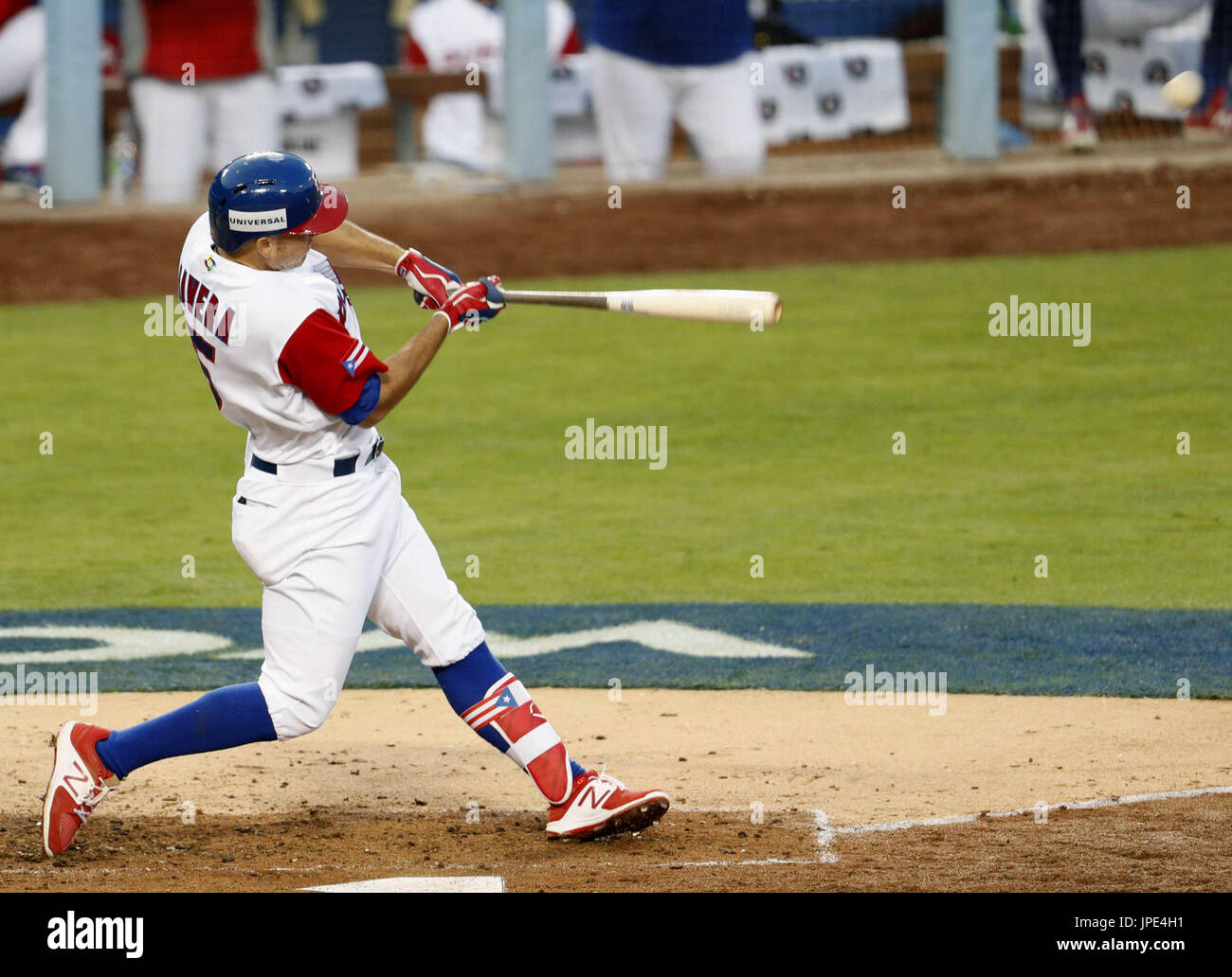 T.J. Rivera of Puerto Rico hits a go-ahead solo homer during the second ...